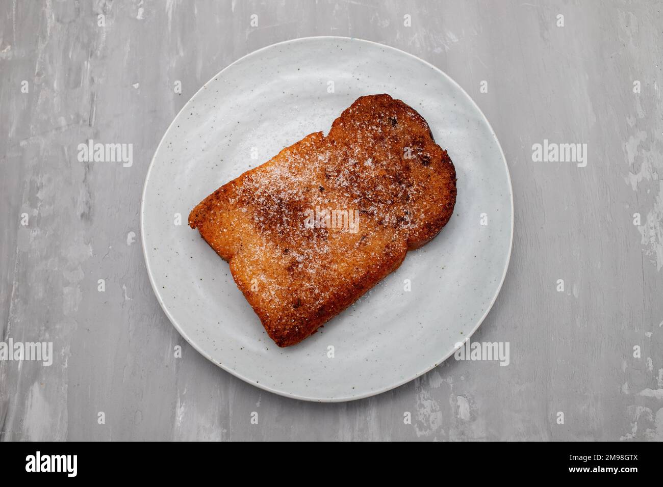 Baked or fried bread with sugar and cinnamon. Dessert called Rabanada ...