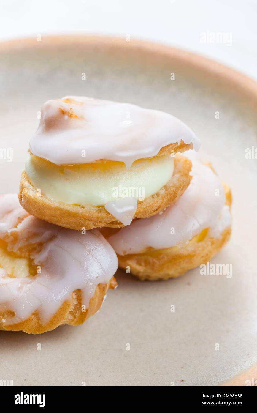 Three cream puffs hi-res stock photography and images - Alamy
