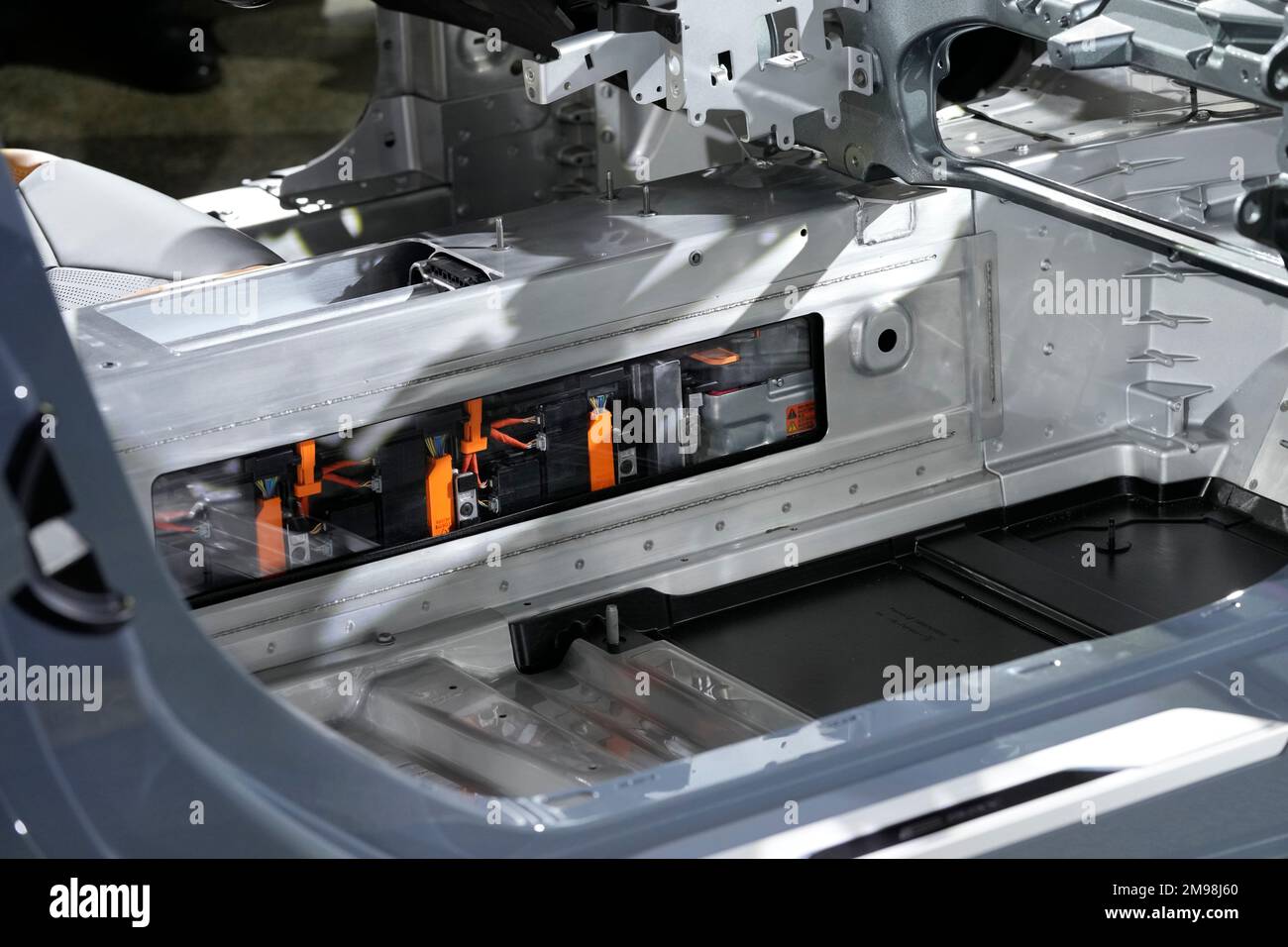 The 2024 Corvette E Ray auxiliary power module and battery is displayed ...