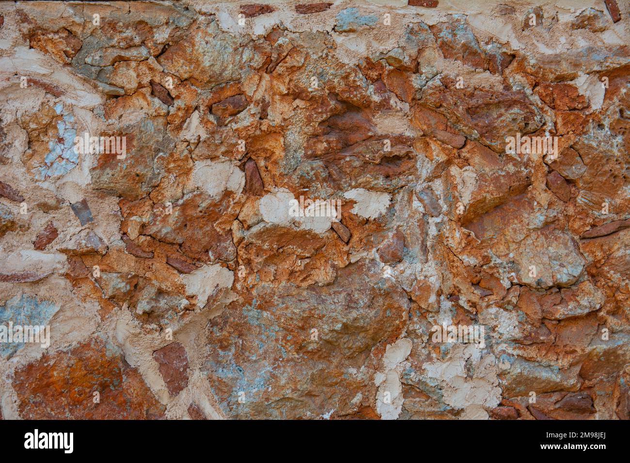 The stone wall of old vintage house captured in old city of Alanya ...