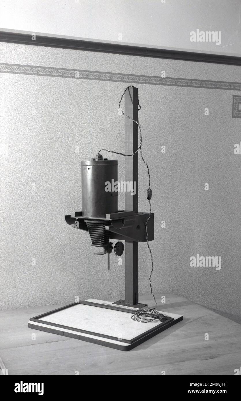 1950s, historical, a photo enlarger of the era, on stand, with base ...