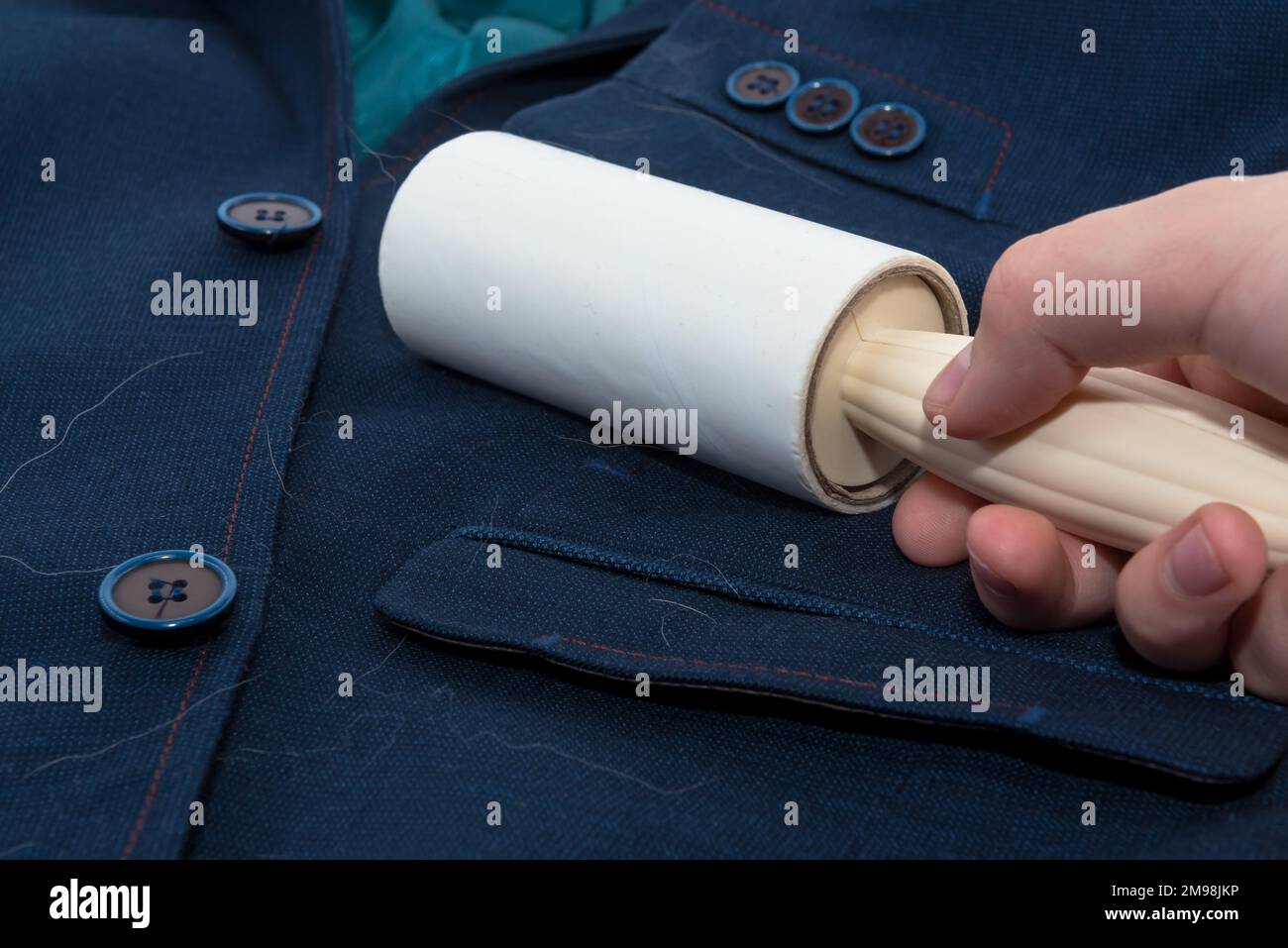 Roller for cleaning clothes from dust, debris and dirt. Clothing care ...