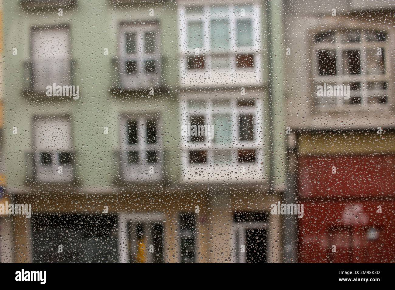 rainy day and drops of water in the kitchen windows Stock Photo - Alamy