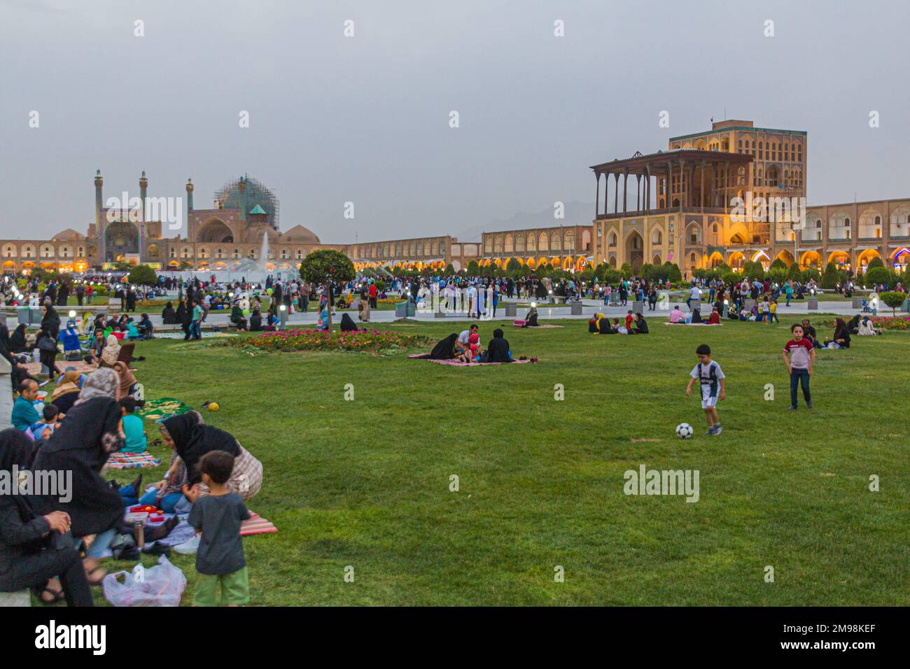 ISFAHAN, IRAN - JULY 10, 2019: People enjoying evening at Naqsh-e Jahan ...