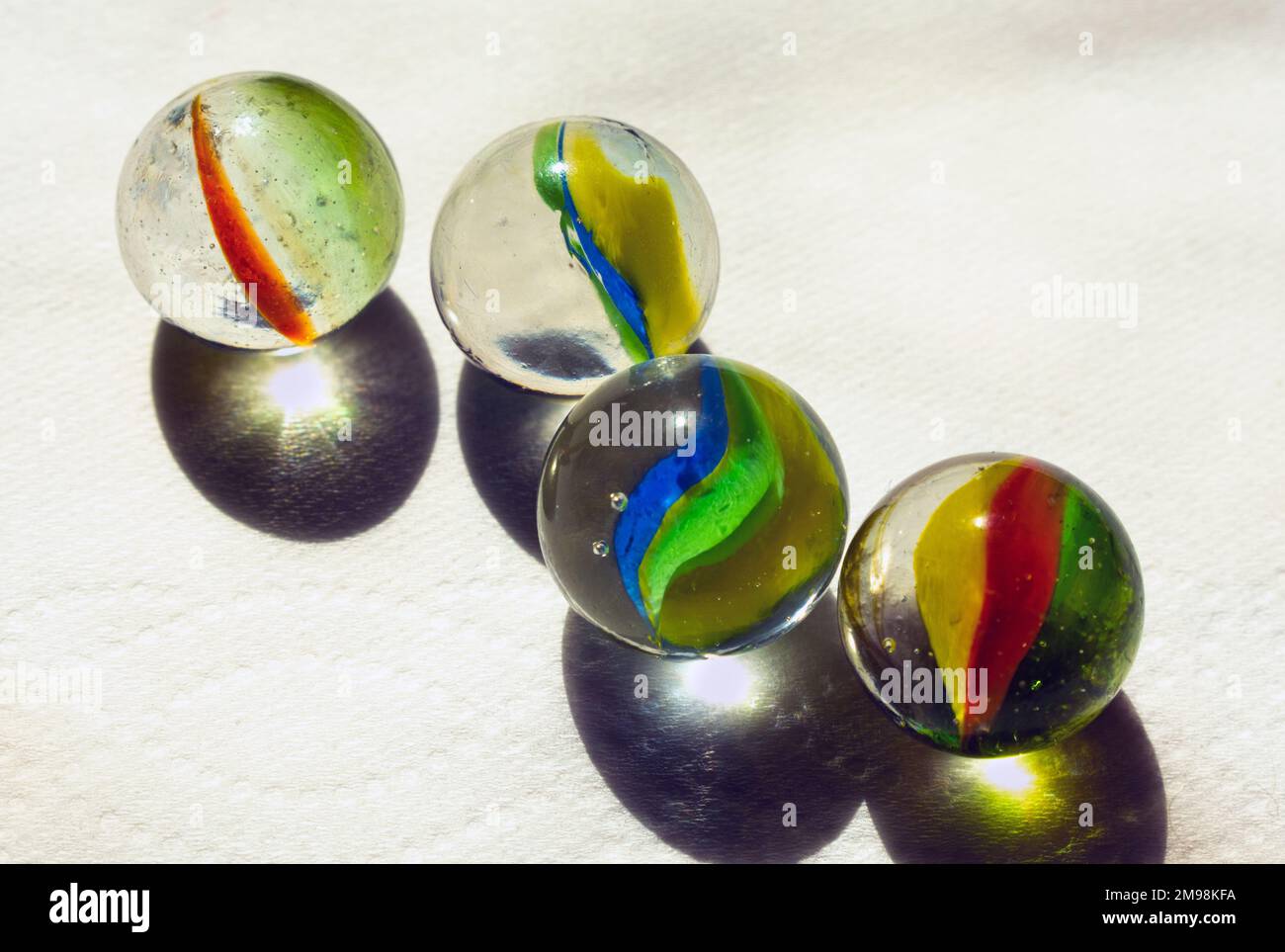 marbles in row Stock Photo - Alamy