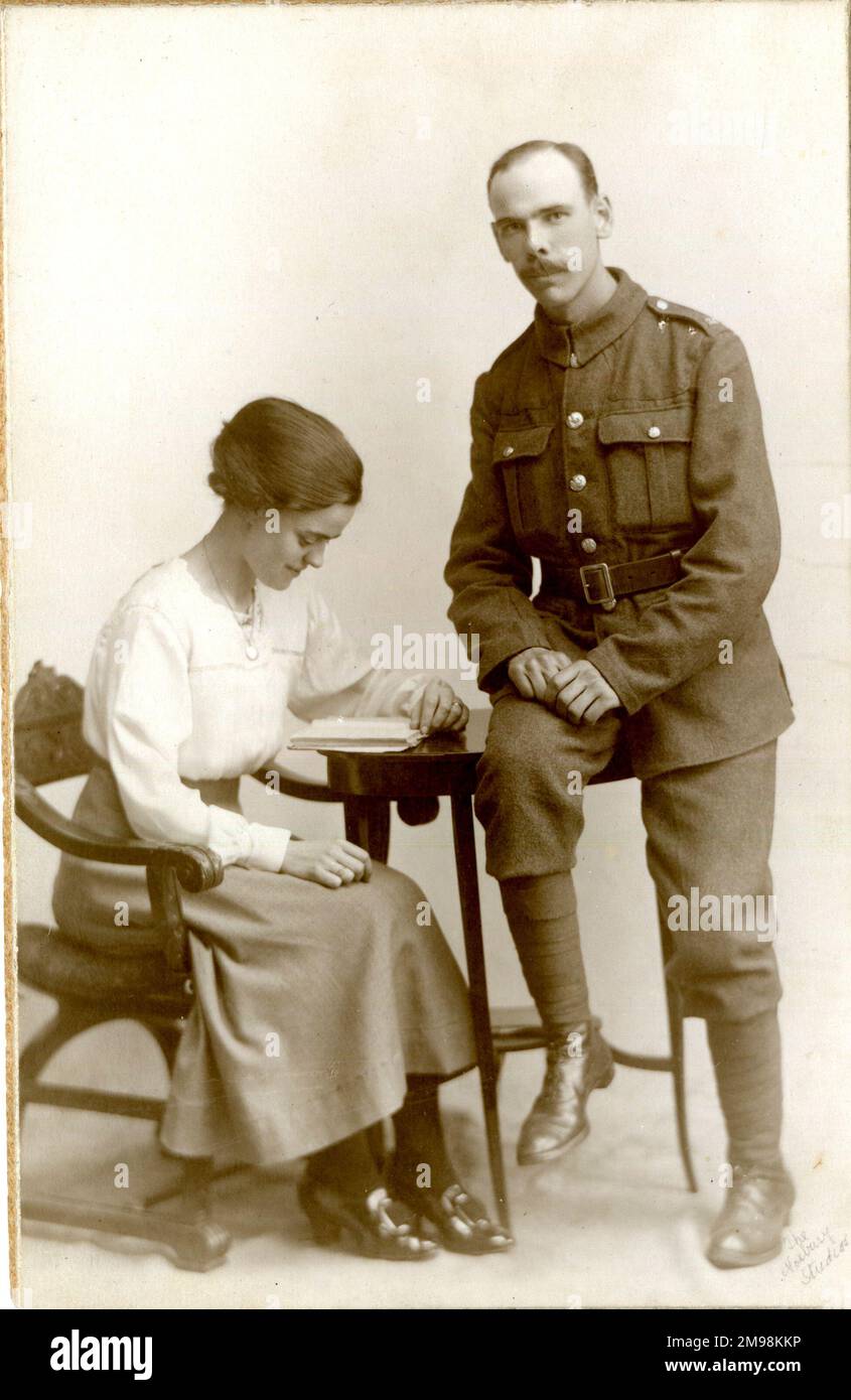Couple in studio photo during the First World War -- he is wearing army ...