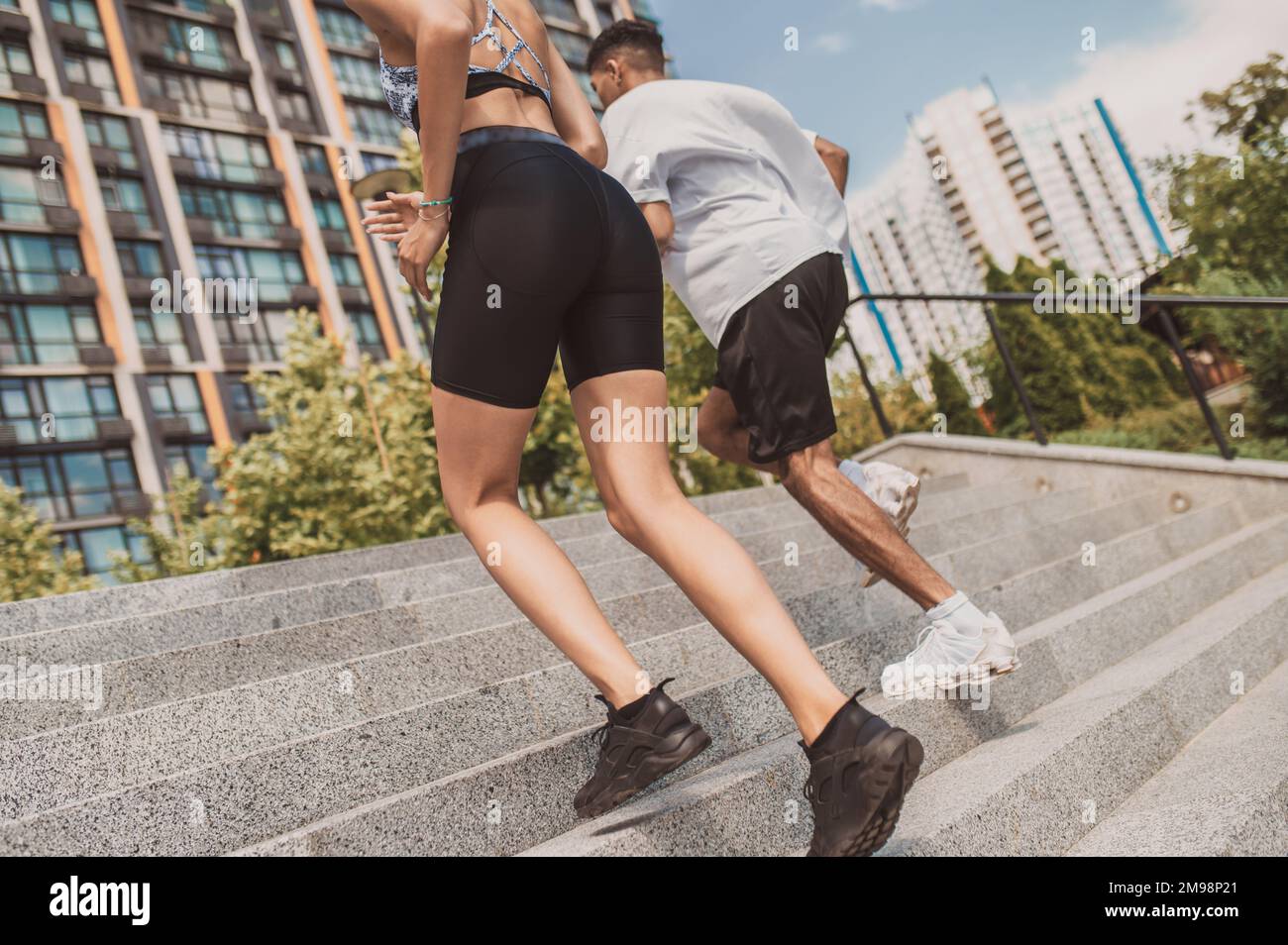 Woman running residential hi-res stock photography and images - Alamy