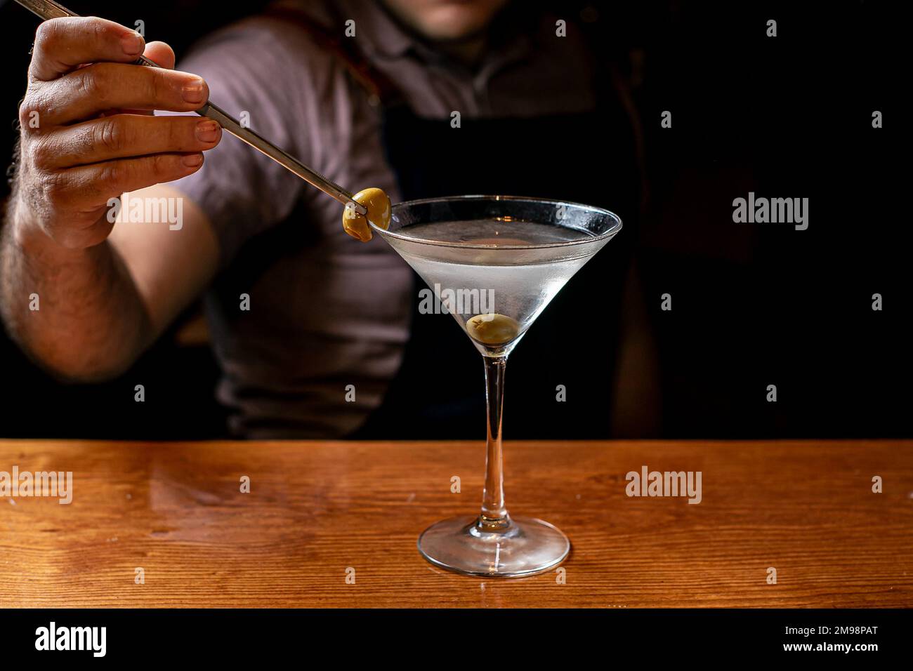 Adding liquid martini glass ice hi-res stock photography and images - Alamy