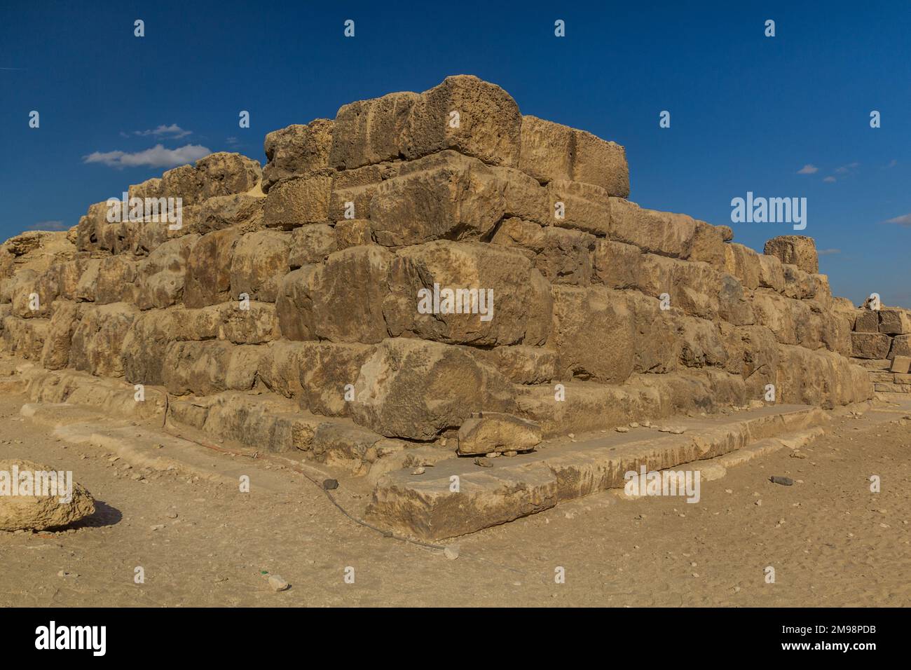 Massive stone wall near pyramids in Giza, Egypt Stock Photo - Alamy