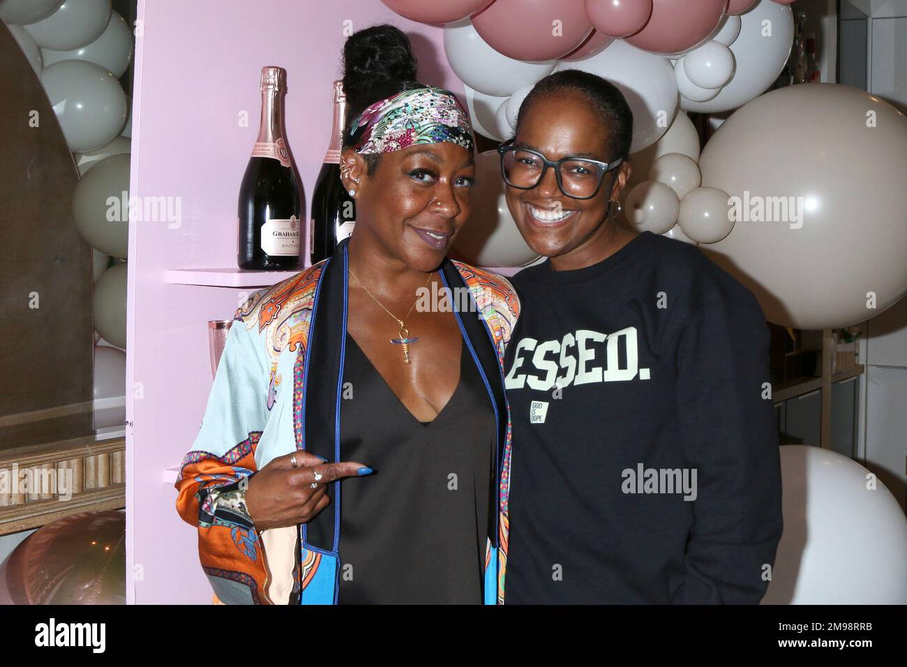 LOS ANGELES - JAN 14: Tichina Arnold, sister Zenay Arnold at Tichina ...