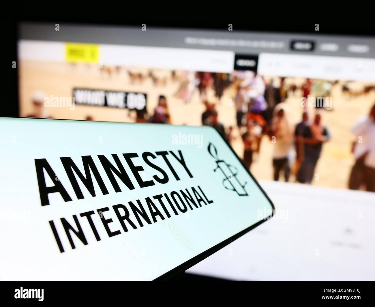 Mobile phone with logo of human rights organization Amnesty ...