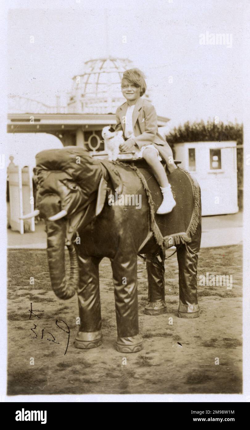 Girl riding an elephant hi-res stock photography and images - Alamy