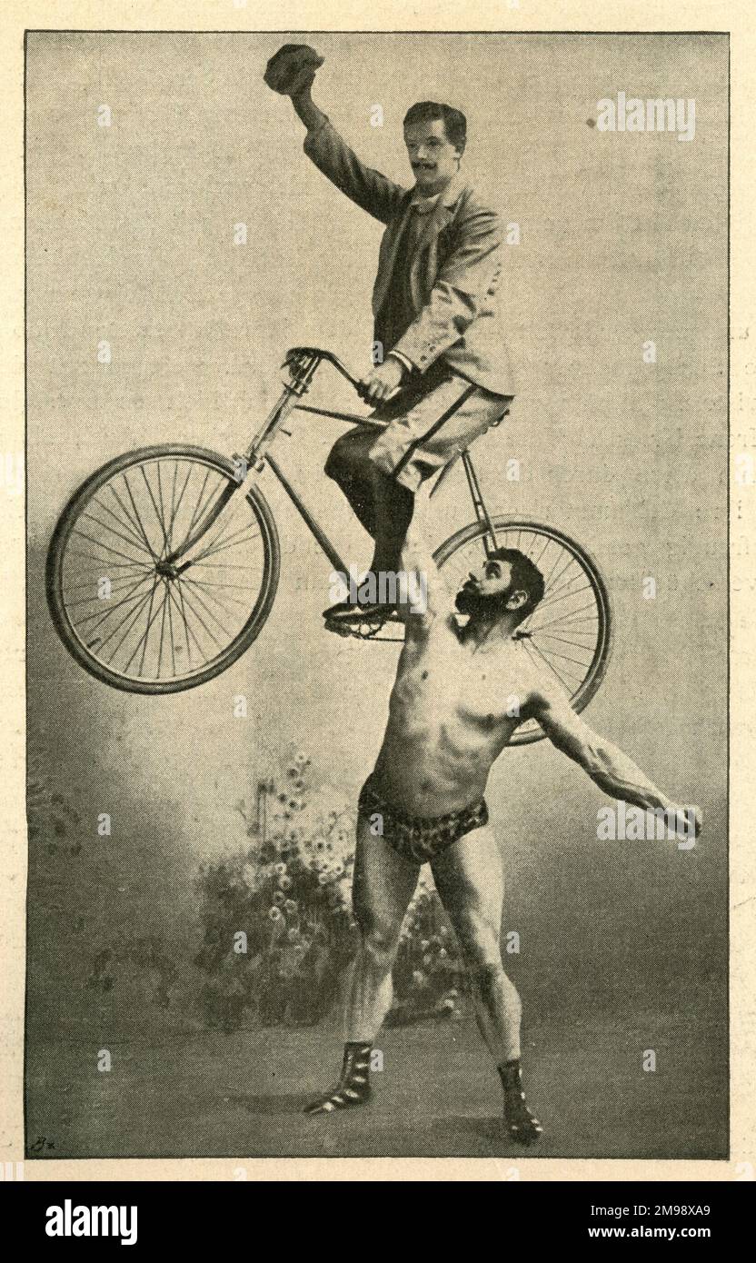 Georg Strangelimcier-Rasso, the strongest man on earth, holding up a ...