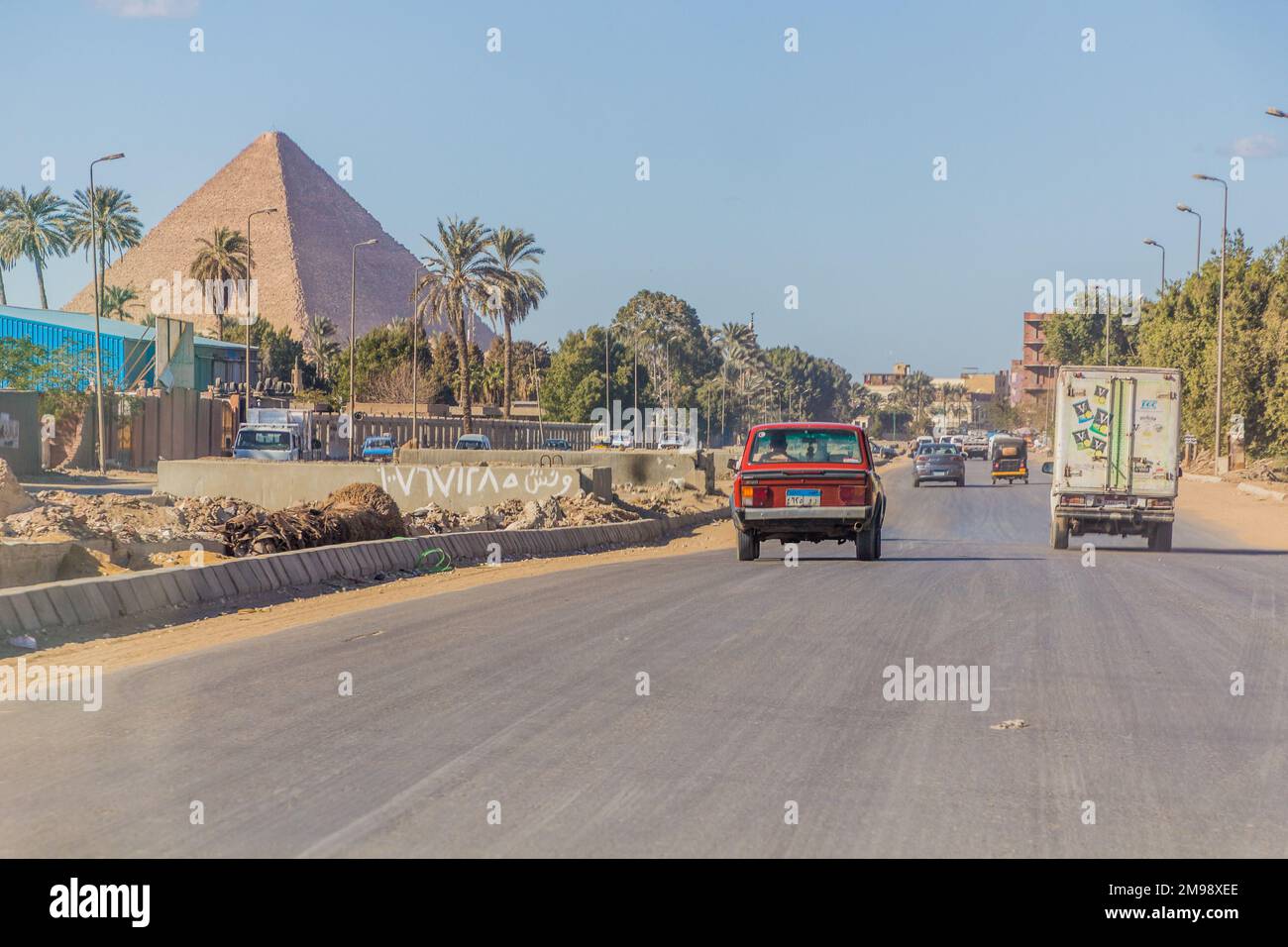 CAIRO, EGYPT - JANUARY 28, 2019: Road traffic in front of the Great ...