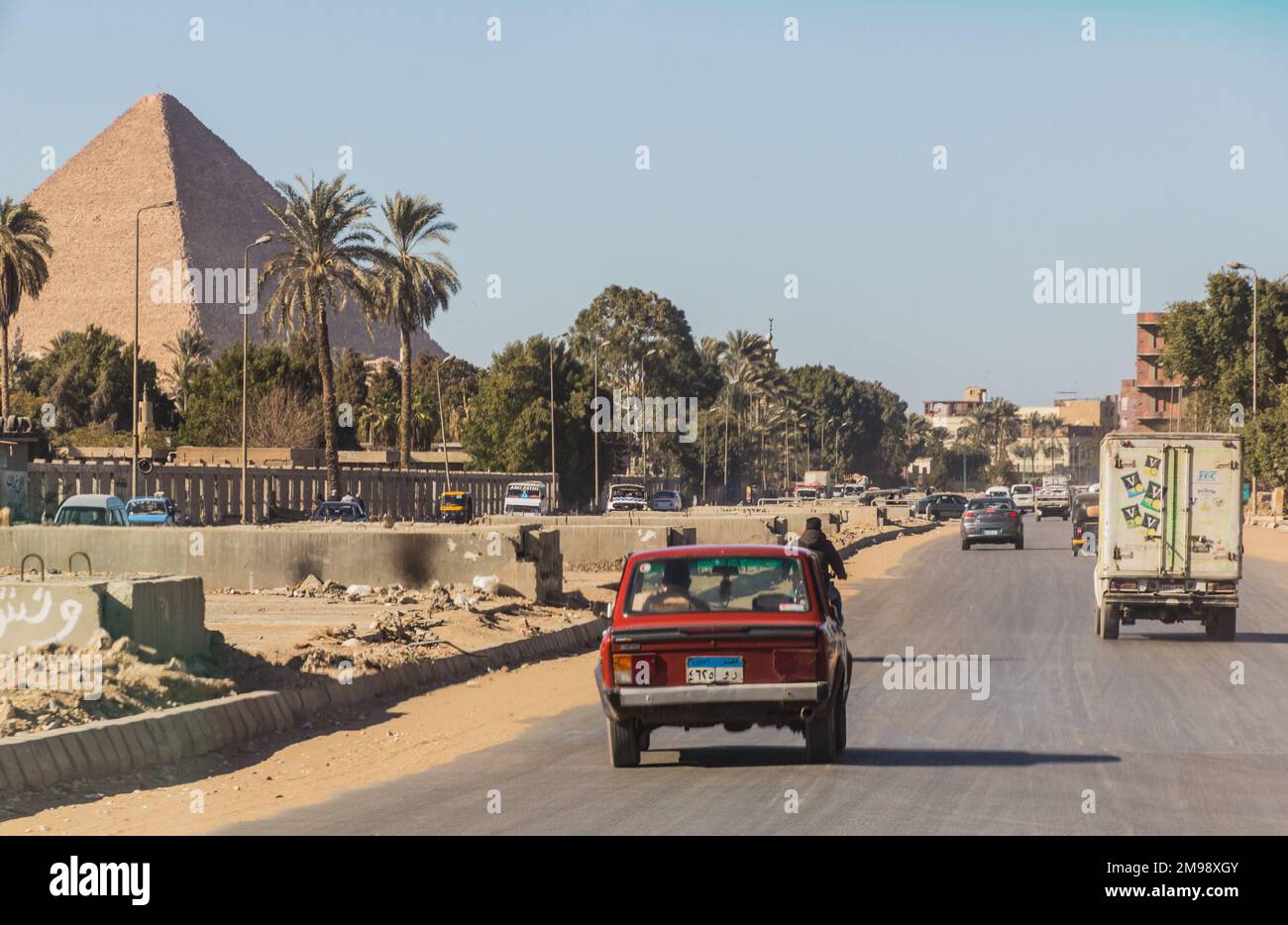 CAIRO, EGYPT - JANUARY 28, 2019: Road traffic in front of the Great ...