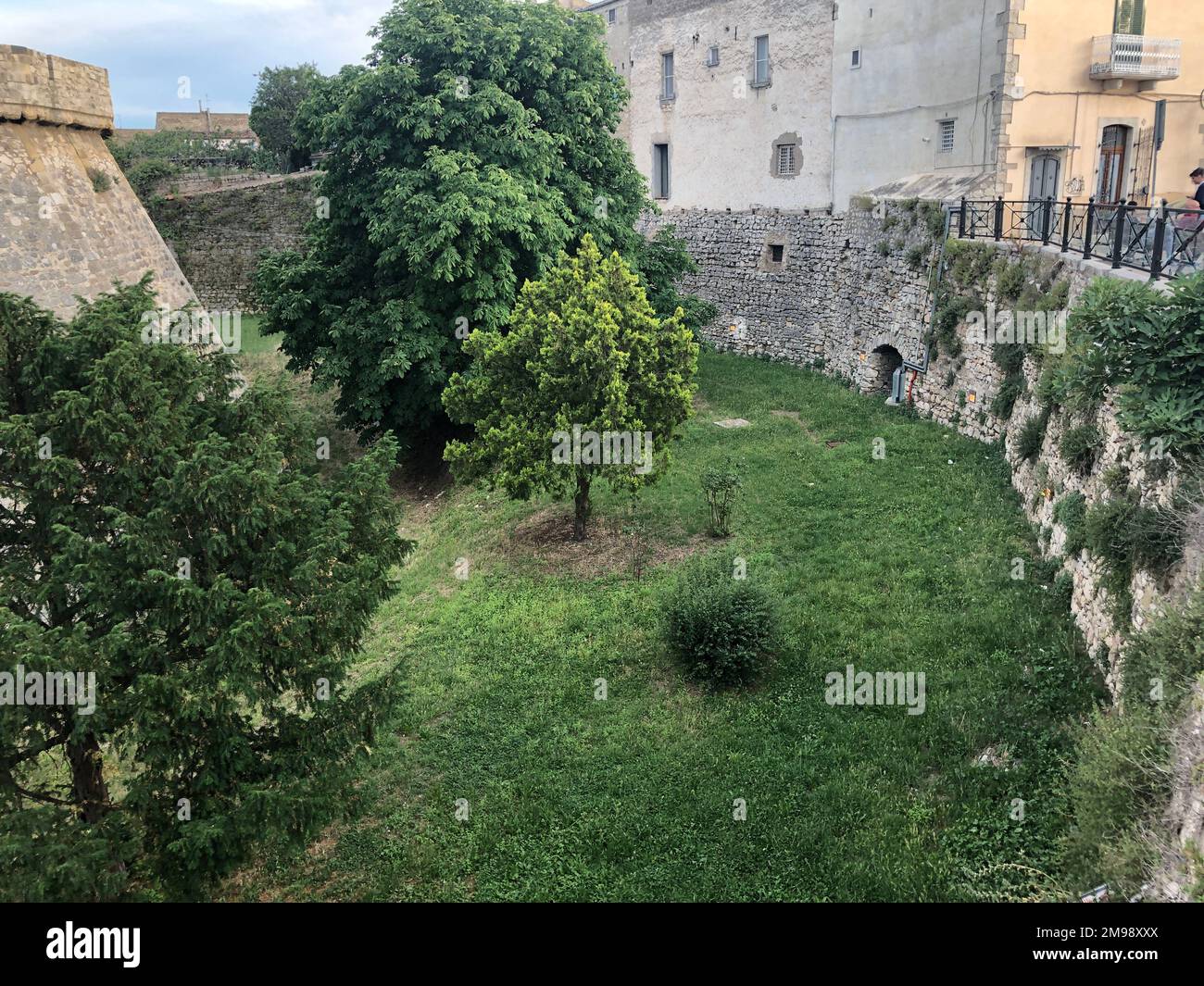 Walls of the Aragonese Castle with moat of Venosa historic city Stock ...