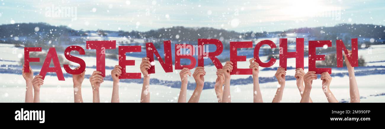 People Hands Holding Word Fastenbrechen Means Fast-Breaking, Winter ...