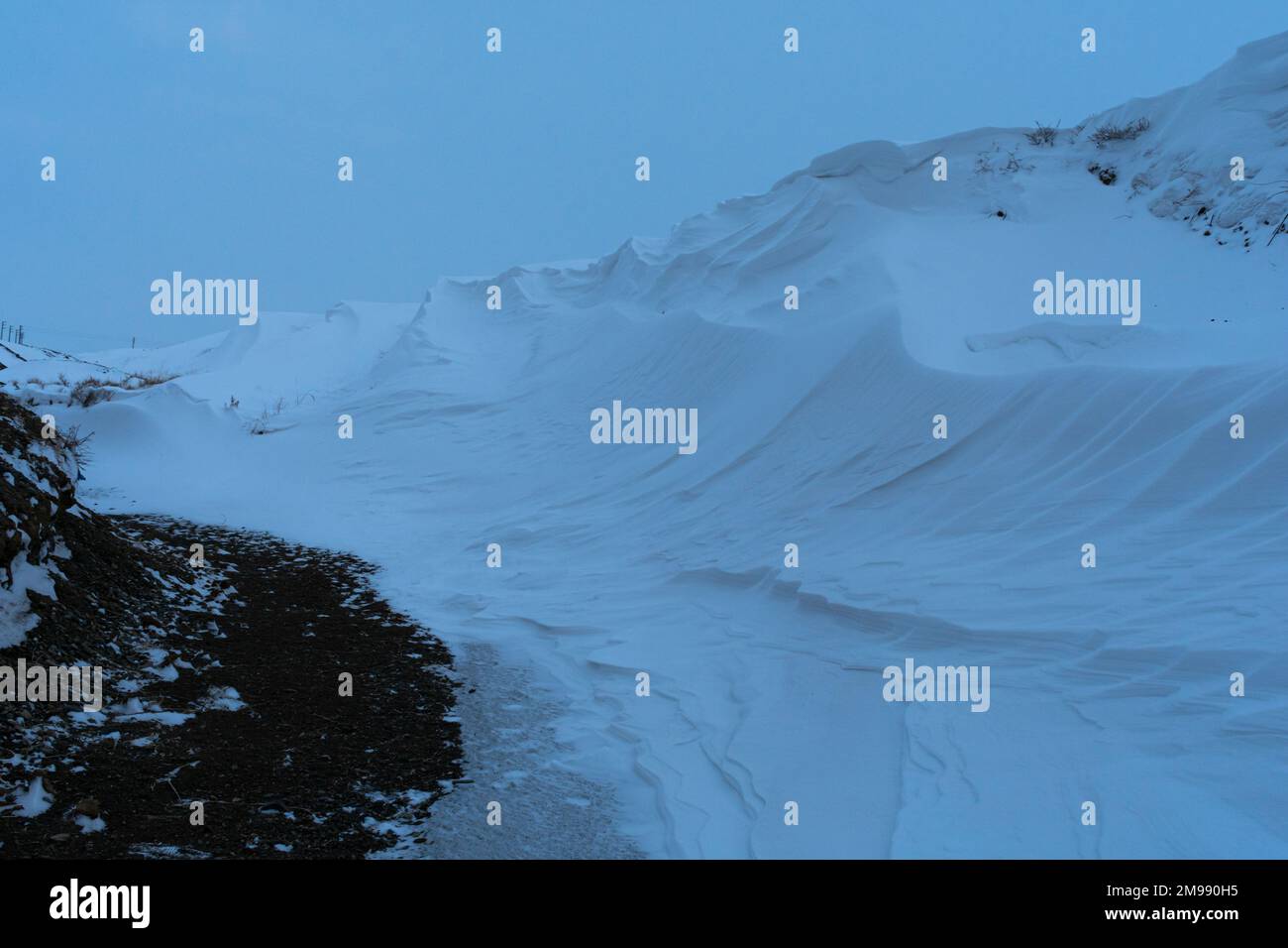 Accumulation of snow in a valley Stock Photo - Alamy