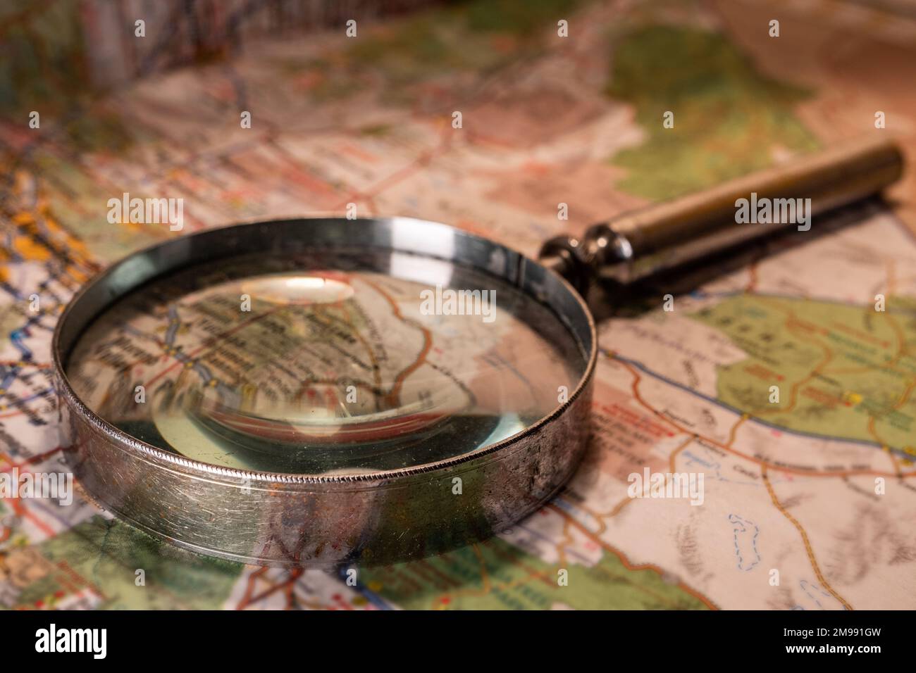 Magnifying glass old map hi-res stock photography and images - Alamy