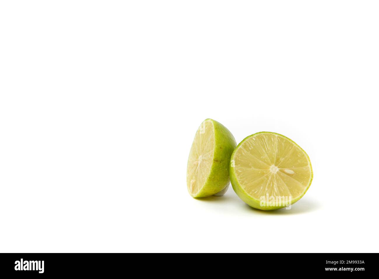 Studio photo of a halved lemon with white background Stock Photo - Alamy