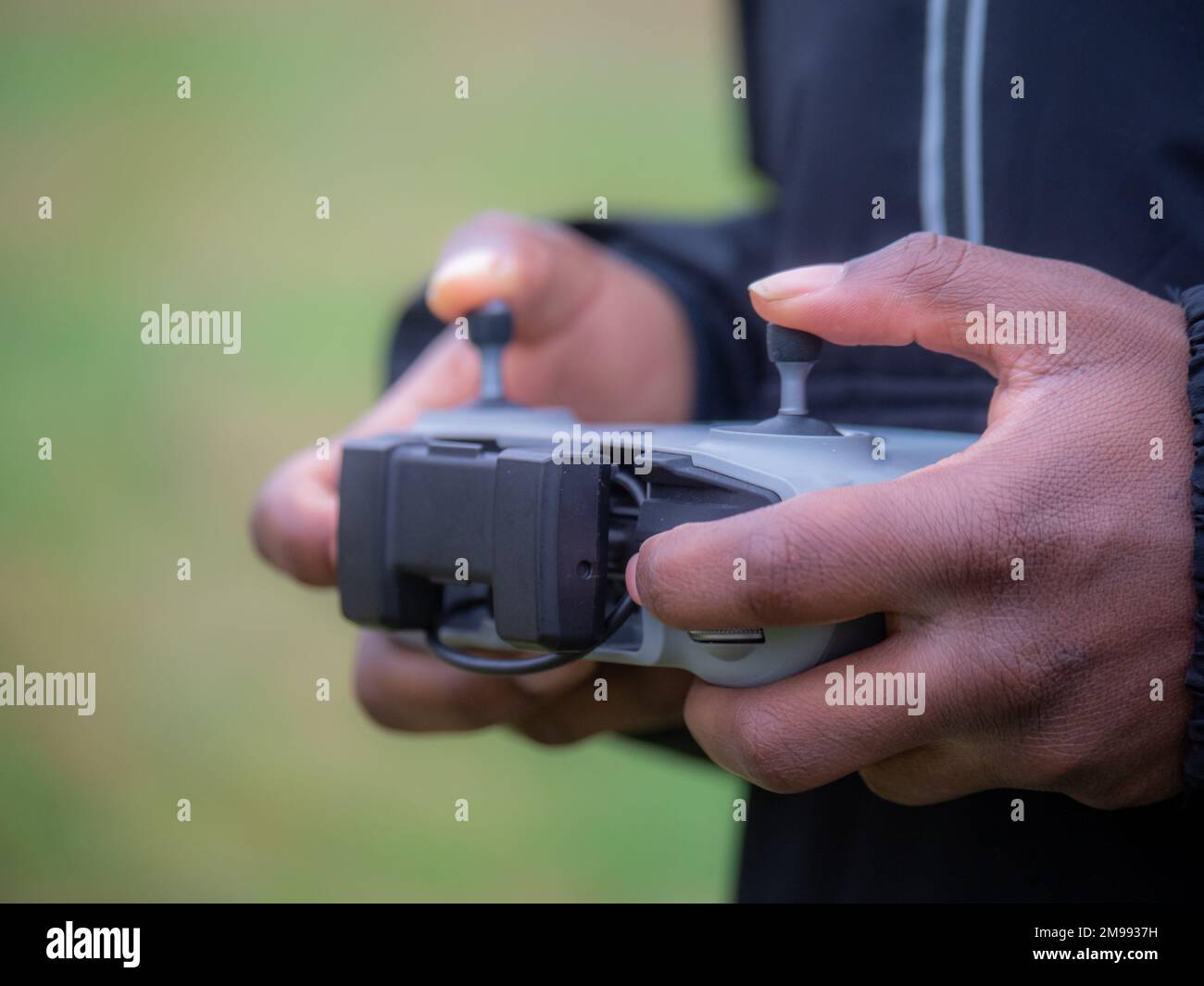 Cheerful young teengaer african american dressed in sportswear flying a ...