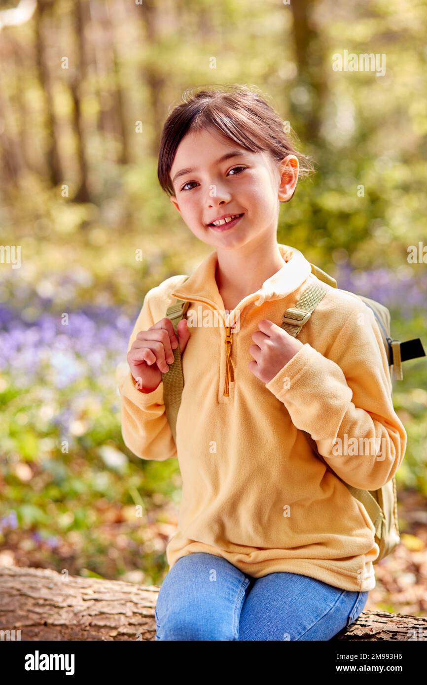 Portrait Of Girl Walking Through Bluebell Woods In Springtime Taking A ...
