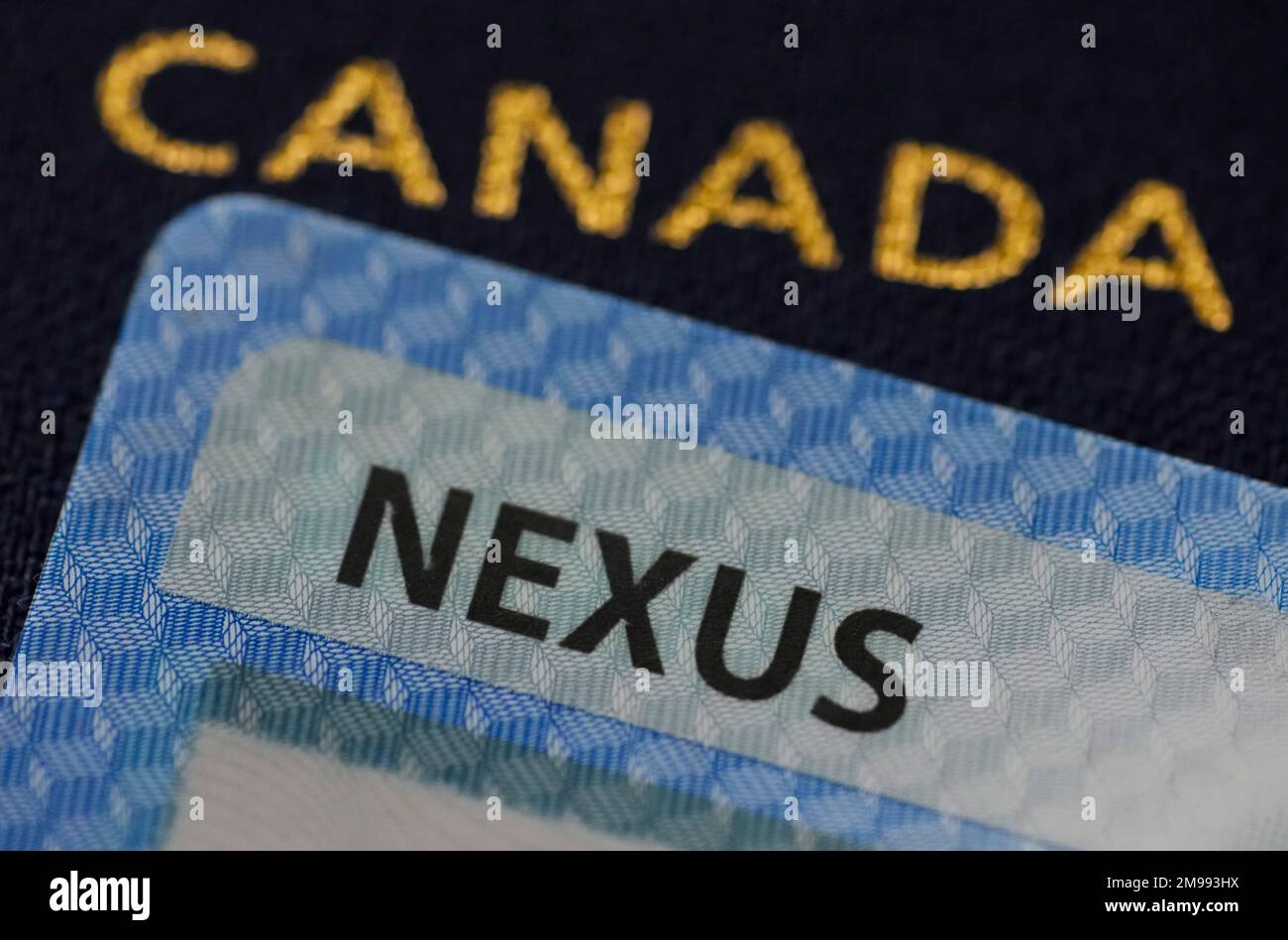 A NEXUS card and a Canadian passport are pictured in Ottawa on Tuesday, Jan. 17, 2023. THE ...