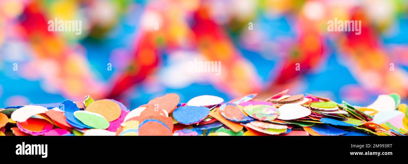 Colourful confetti streamer at party Stock Photo - Alamy