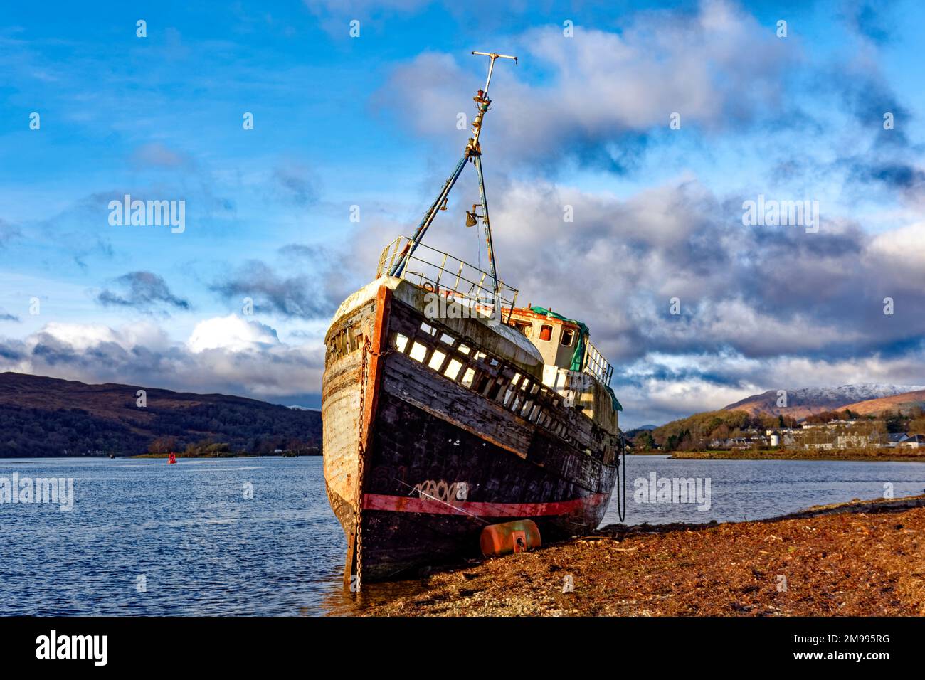 Old Boat of Caol Fort William Scotland blue sky the boat lying on the ...