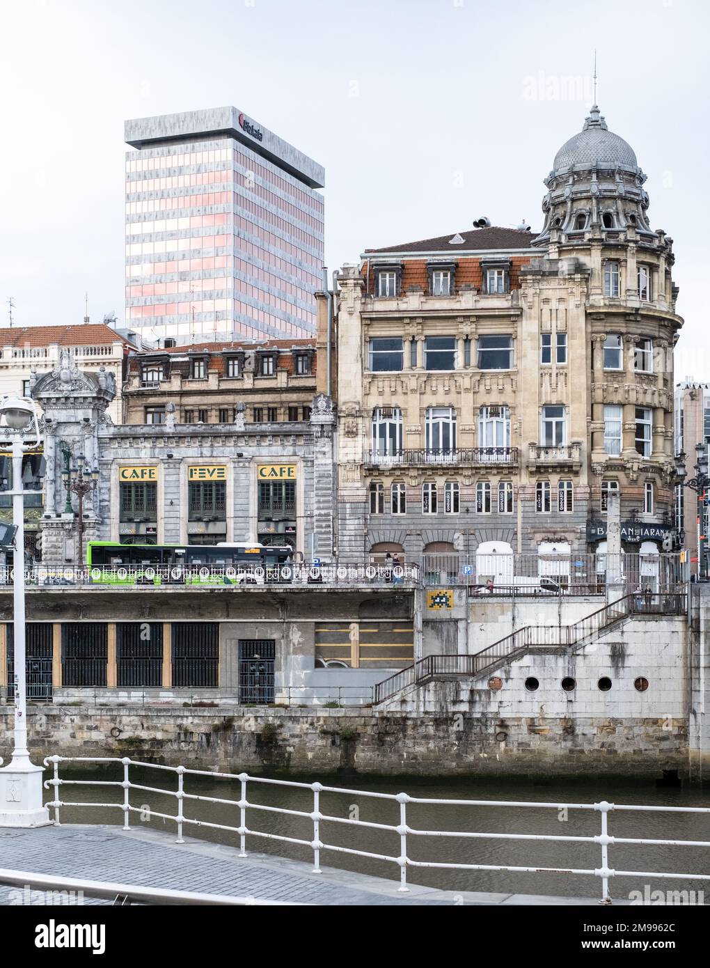 Looking across the Nervión River at ornate buildings including the ...