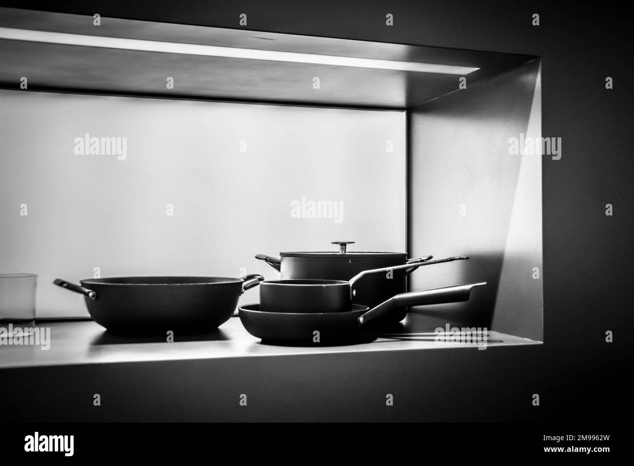 A minimalistic still life with pots and pans in black and white Stock ...