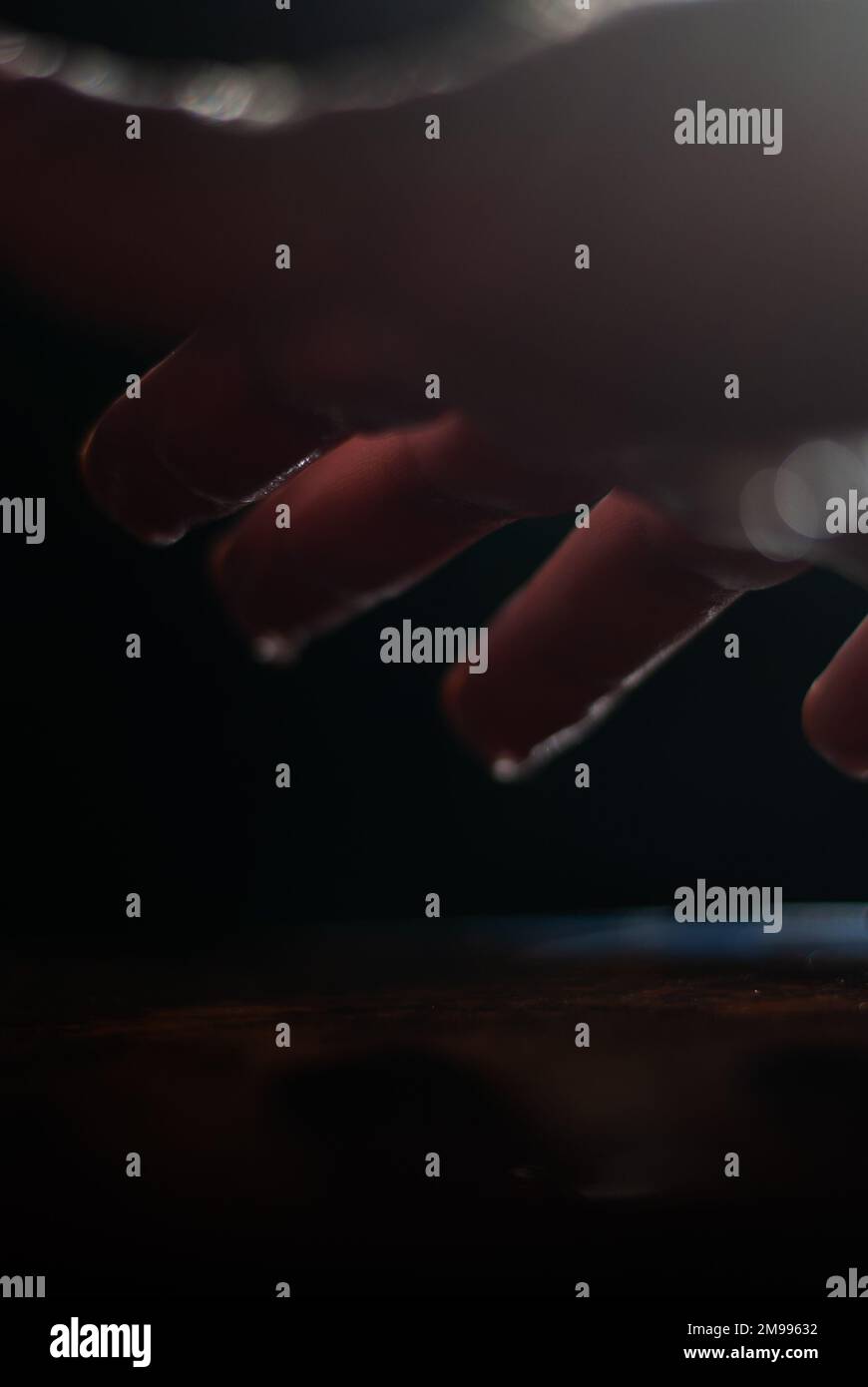 Hand over the plate of water Stock Photo - Alamy