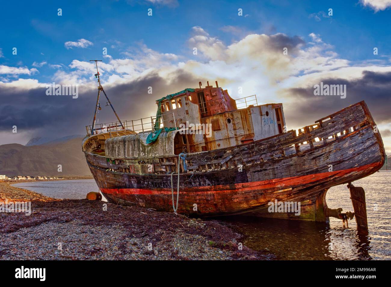 Old Boat of Caol Fort William Scotland the boat lying on the beach in ...