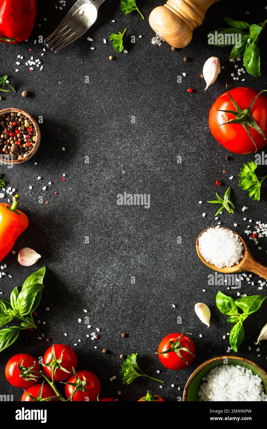 Food frame, ingredients for cooking. Food cooking background on black ...