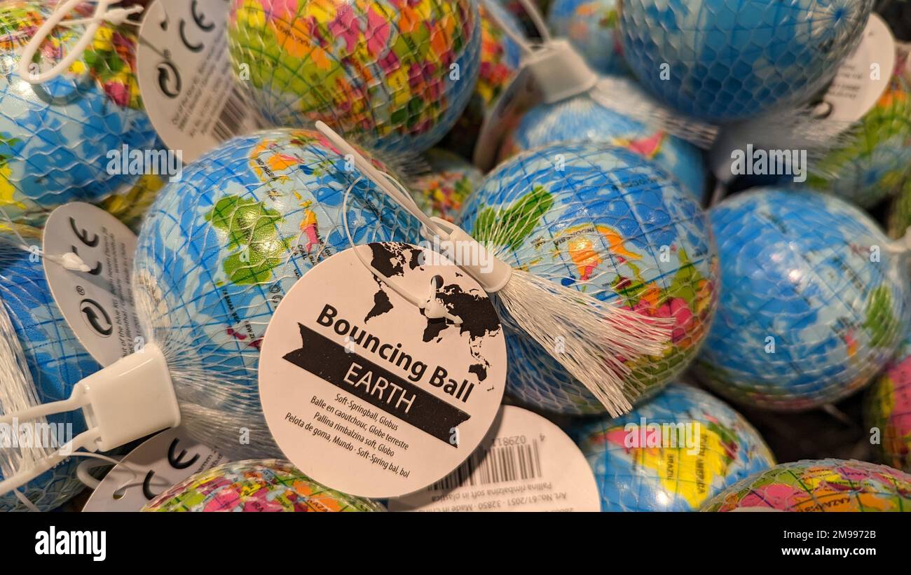 Earth bouncing ball on display in shop Stock Photo - Alamy