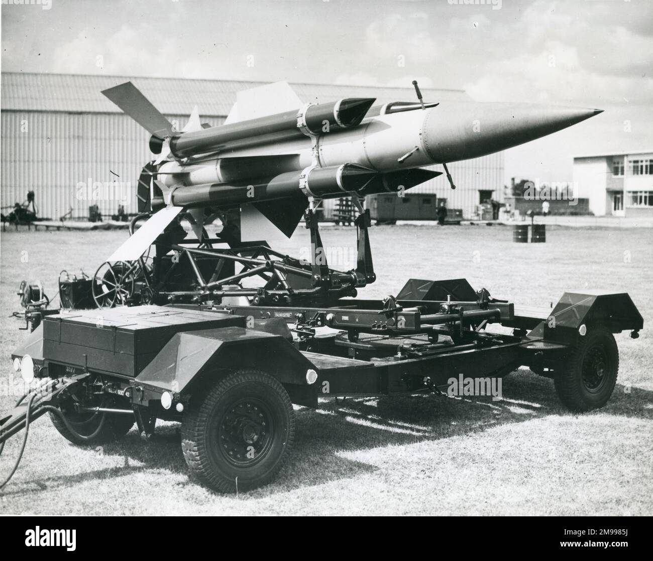 An English Electric Thunderbird surface-to-air guided missile being transferred from the ...