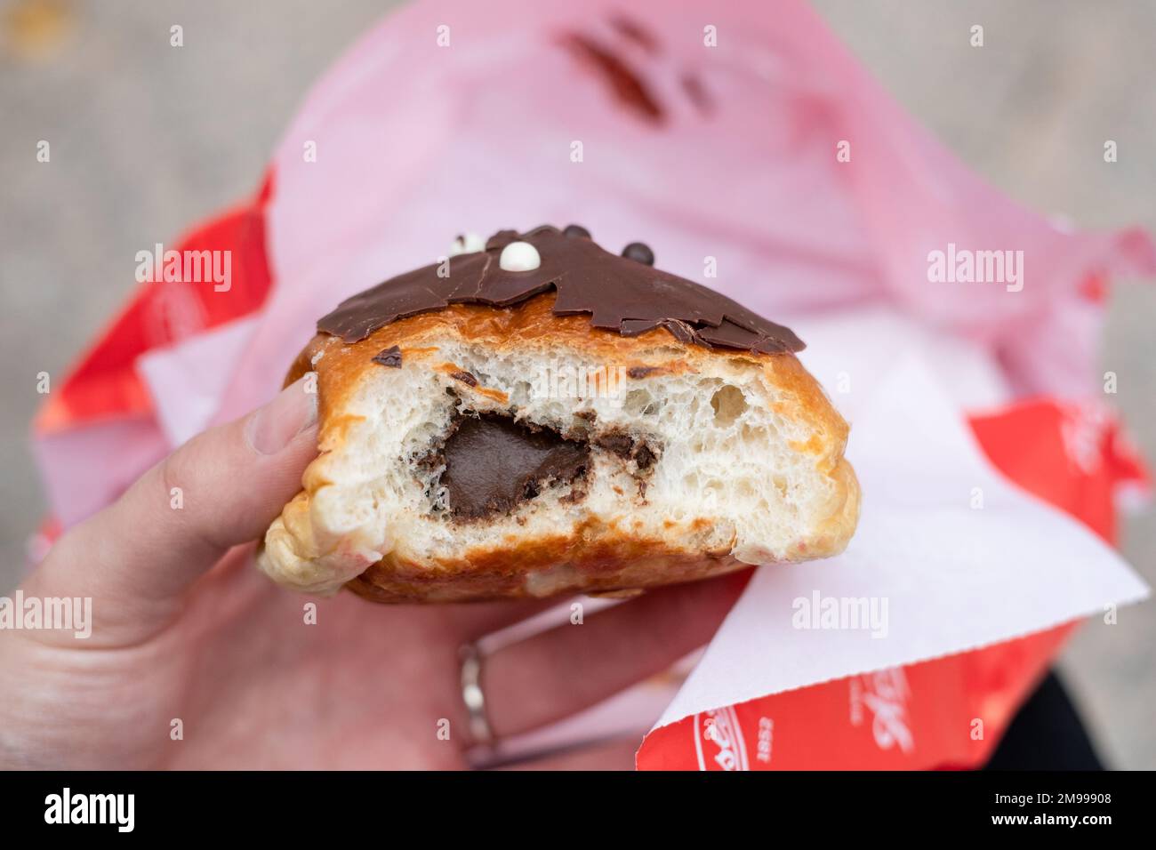 Chocolate bun from Pastelería Arrese 1852, with a bite taken out of it ...