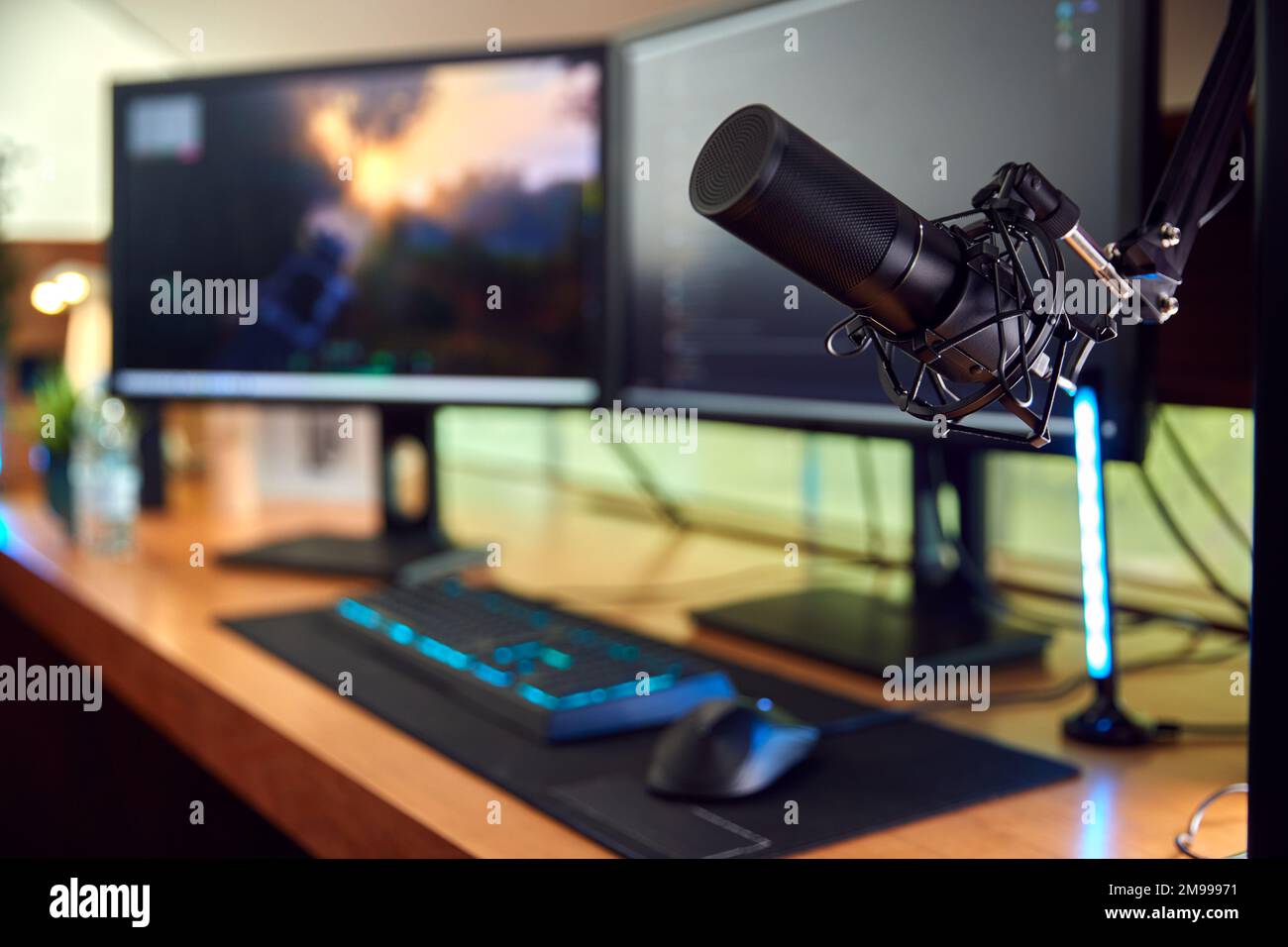 Gaming Computer Setup On Desk At Home With Microphone And Multiple ...