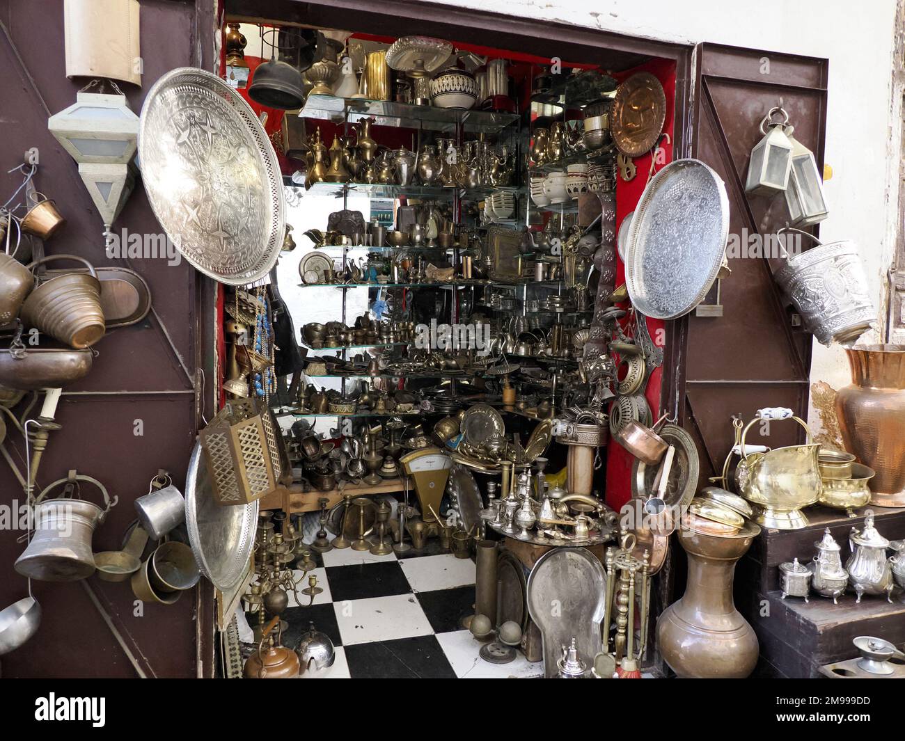 Copper ware shop with crockery, pots and pans in the metal work part of ...