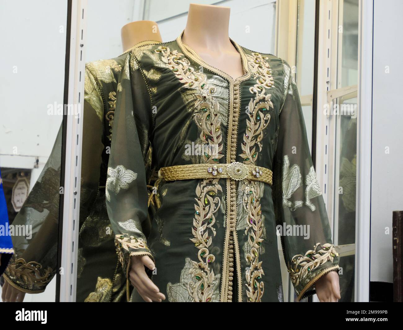 woman dress shop in fez Budget clothes boutique in Morocco Stock Photo ...