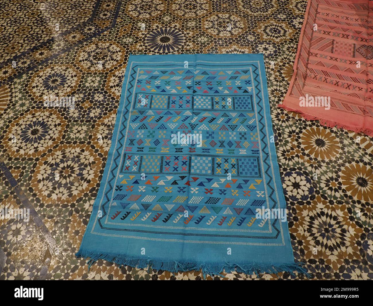Moroccan handmade carpet at a shop in Medina of Fez Stock Photo - Alamy