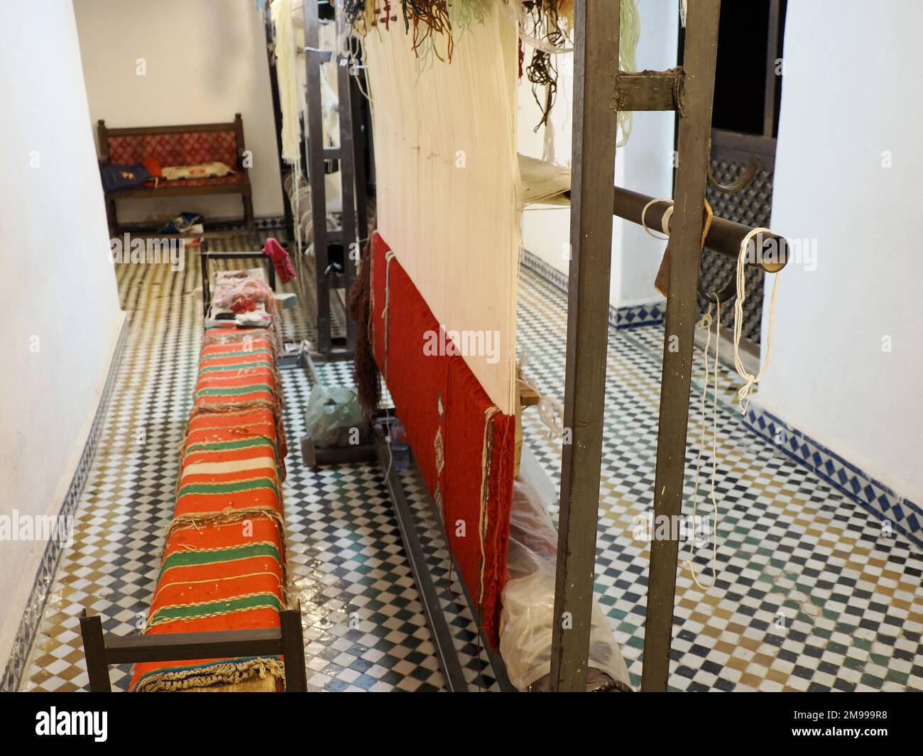 Moroccan handmade carpet at a shop in Medina of Fez Stock Photo - Alamy