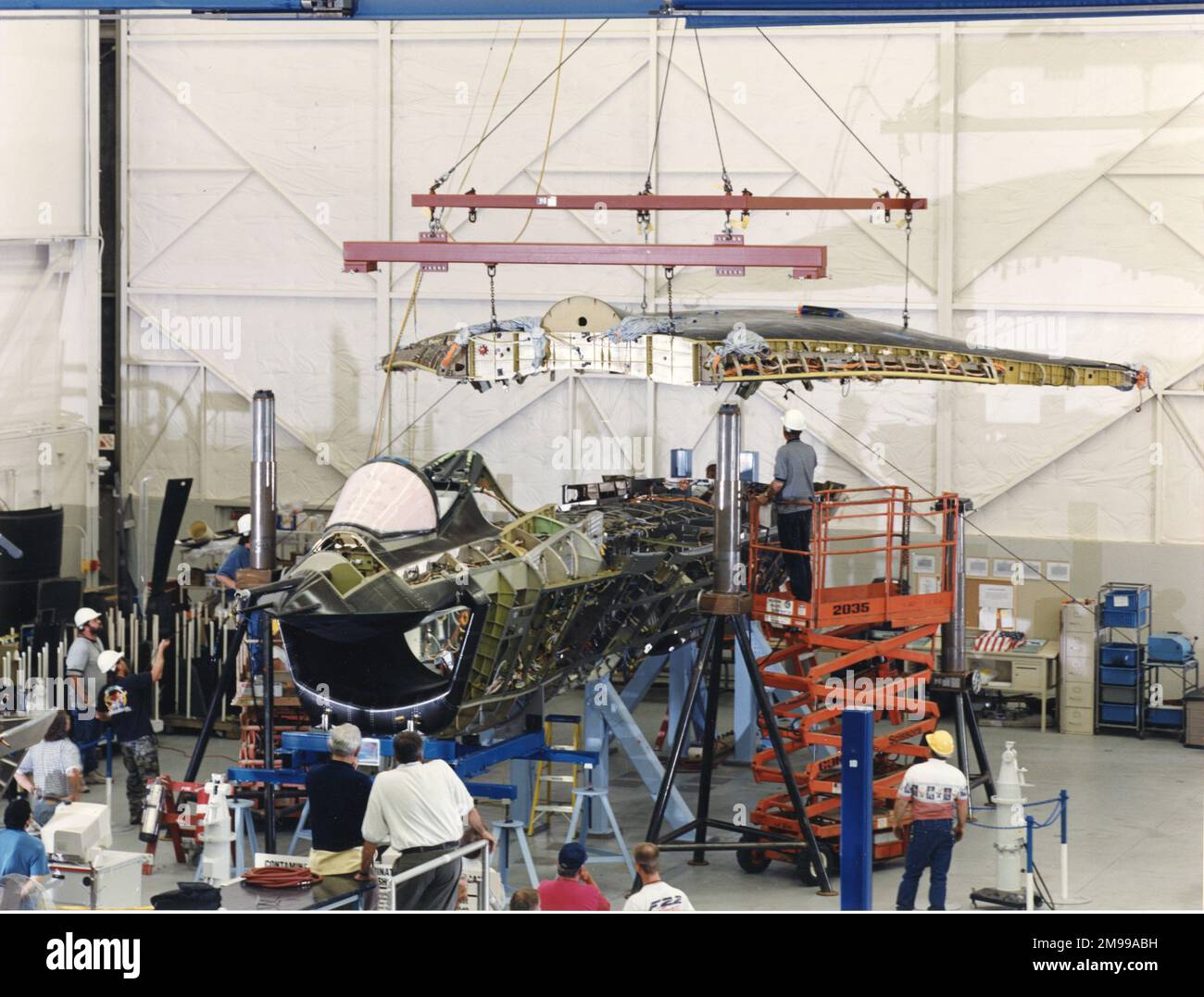 The one-piece wing is lowered into place on the Boeing X-32A Joint ...