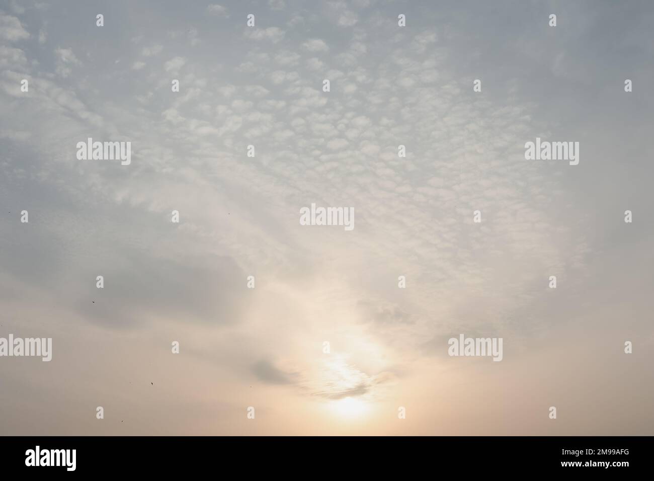scenic evening sunset sky with sun and clouds. magestic dusk cloudscape ...