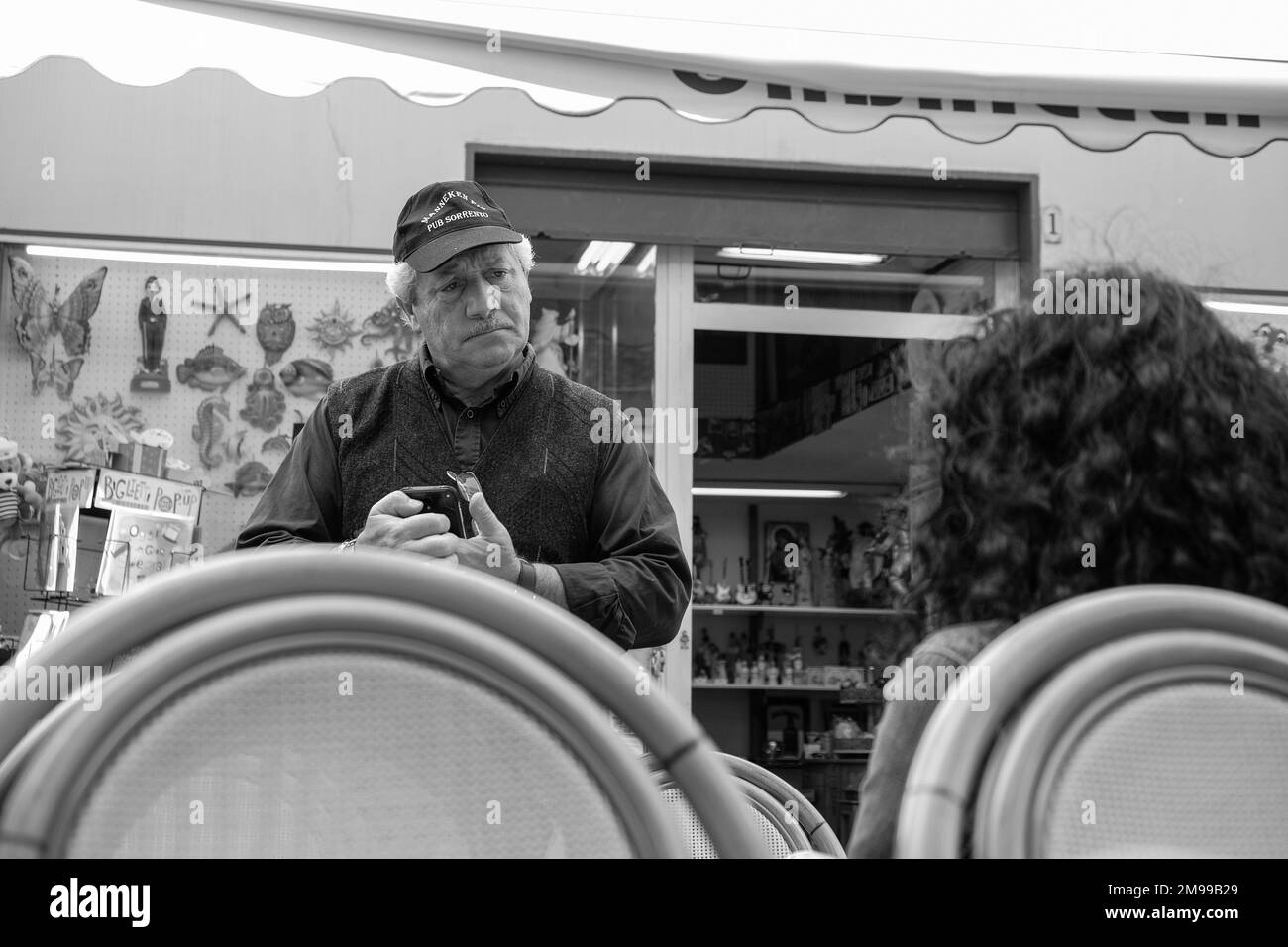Restaurant owner takes a customers order in Sorrento Stock Photo - Alamy