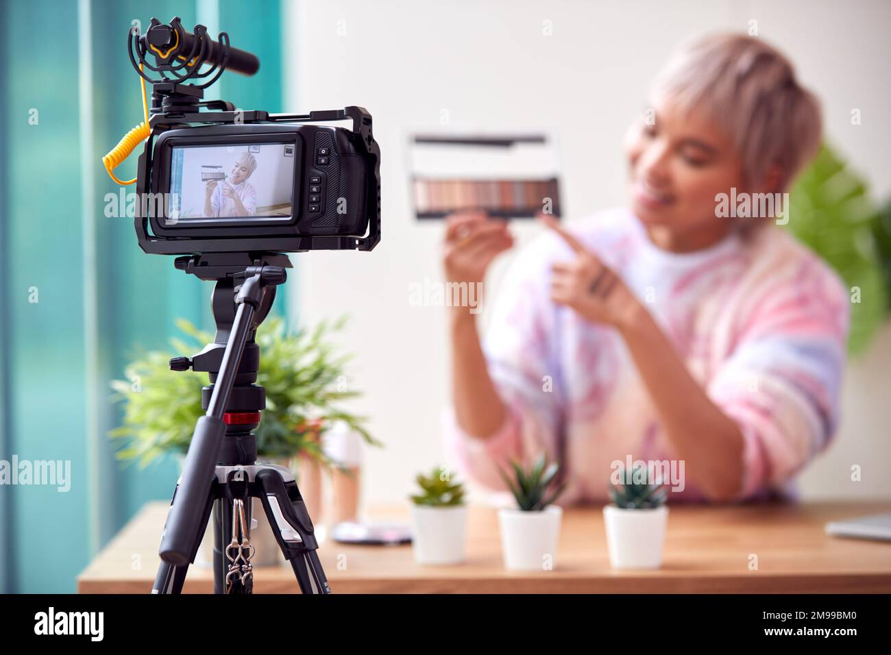 Female Vlogger Recording Beauty And Make Up Video At Home With Camera ...