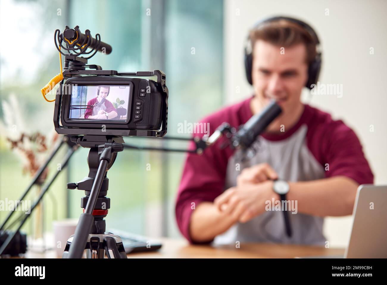 Male Vlogger Recording Wristwatch Product Review Video At Home With ...