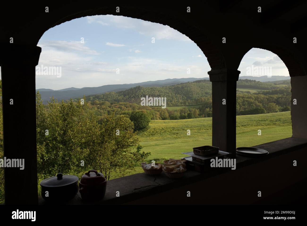 House window on the green Casentino mountains in Tuscany, Italy Stock ...