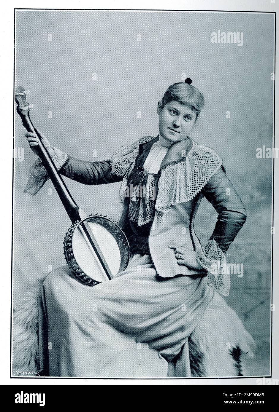 Woman posing with banjo Stock Photo - Alamy