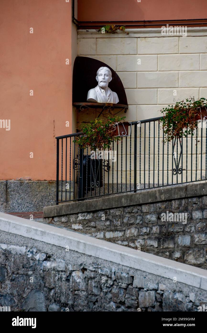 A vertical shot of metal fence of street stairs decorated with flowers ...